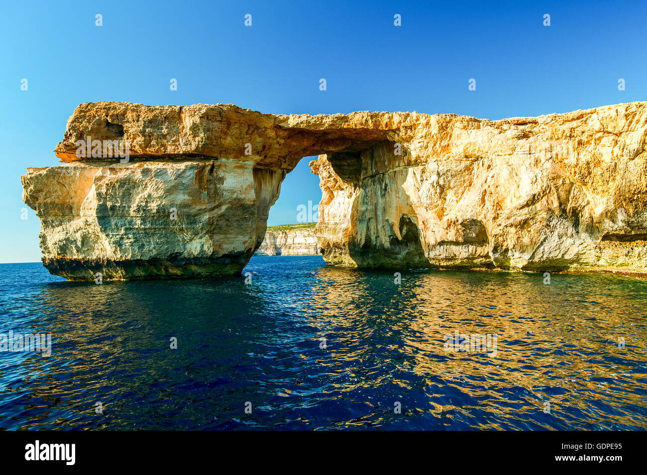 Azure Window, famous stone arch on Gozo island with reflection, Malta ...