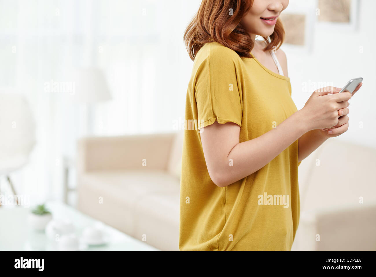 Texting with boyfriend Stock Photo - Alamy