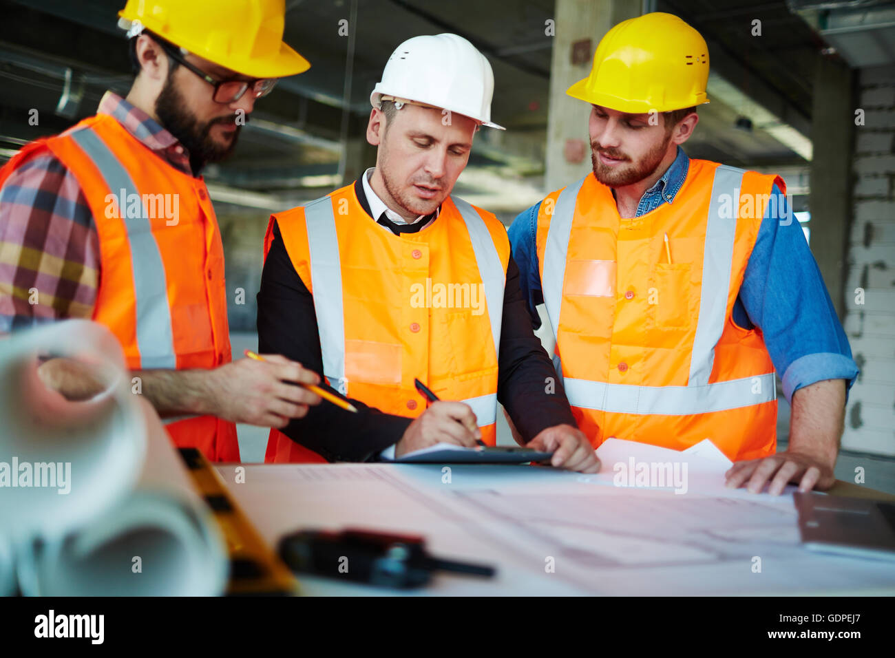 Constructors at work Stock Photo - Alamy