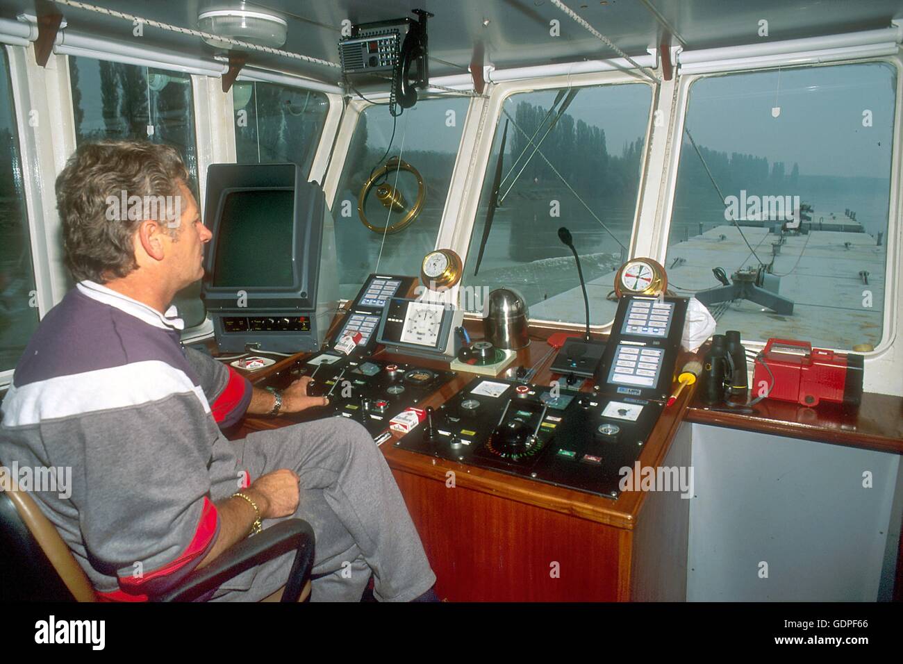pusher boat with barge for goods transport in navigation on the Po ...