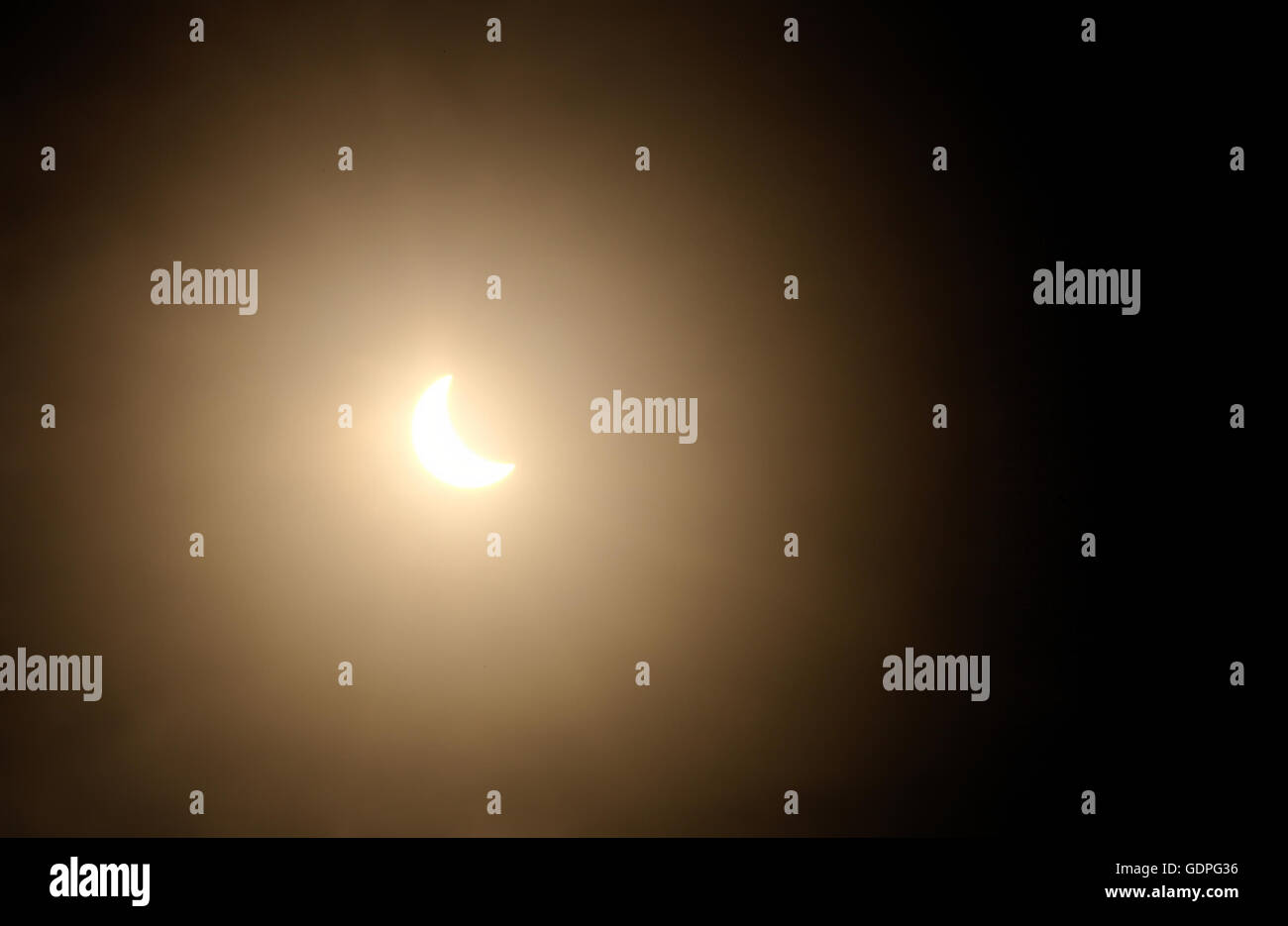 Shot of solar eclipse on March 20, 2015 in Germany, with warm colors ...