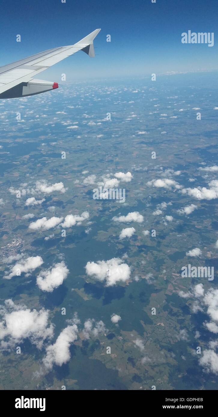 View of the jet plane wing and sky from passenger hi-res stock ...