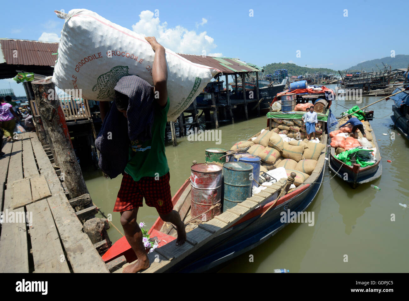 people at the Pier in the city of Myeik in the south in Myanmar in ...
