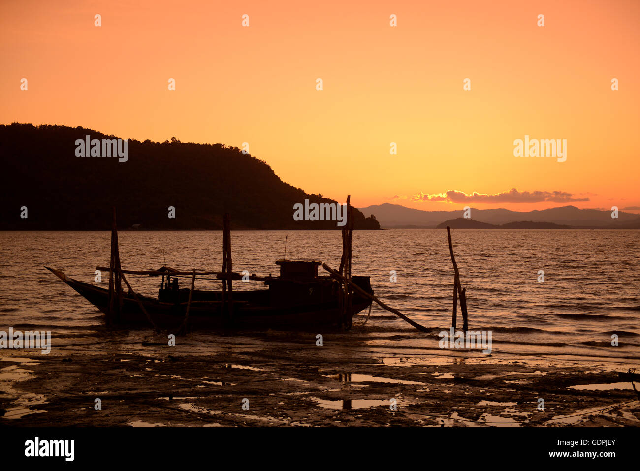 the sunset at the Harbour at the coast of the Andaman sea of Myeik in ...