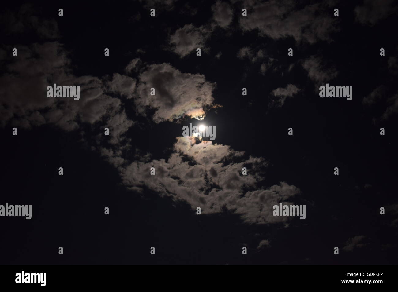 Moonlight in cloudy sky Stock Photo - Alamy