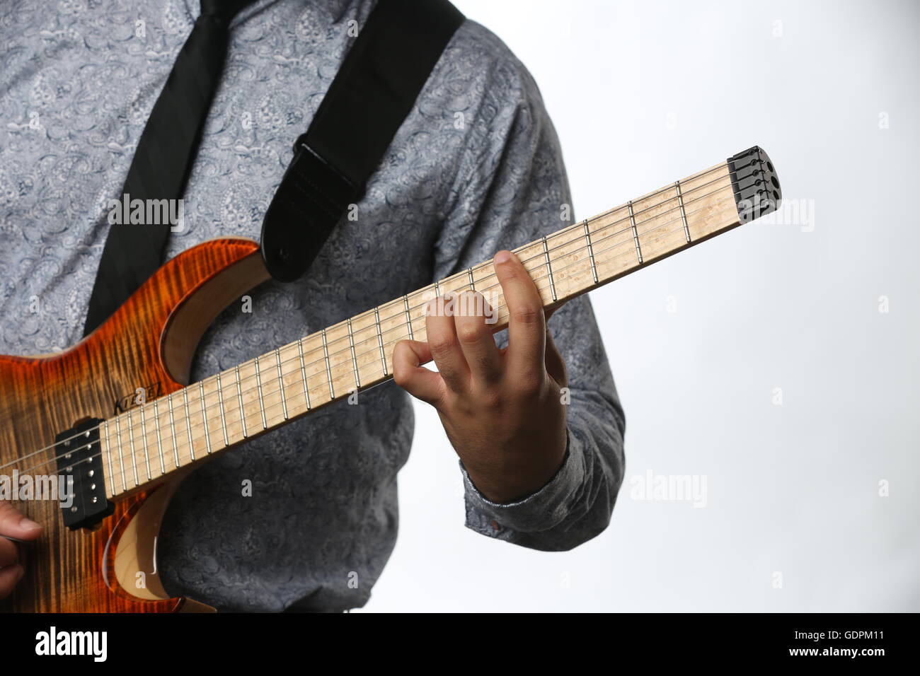 close up shot of strings and guitarist hands playing guitar Stock Photo ...