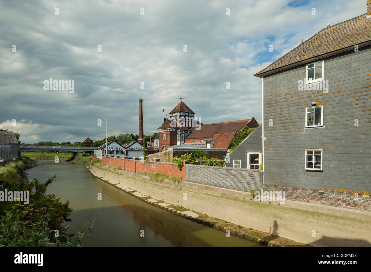Summer afternoon on Ouse river in Lewes, England. Harvey's Brewery in ...