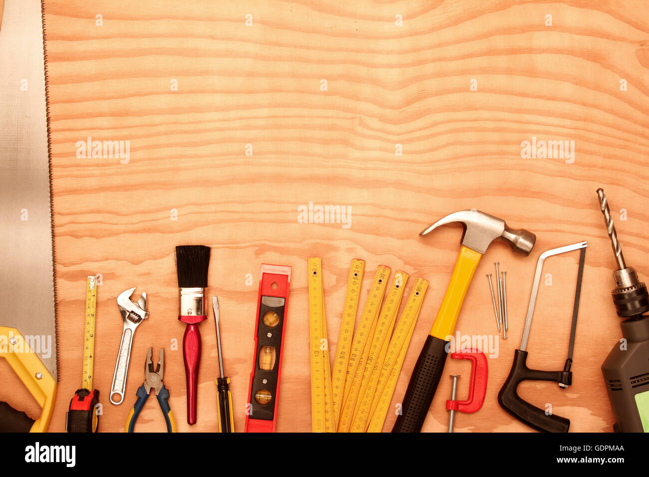 Assorted work tools on wood Stock Photo - Alamy