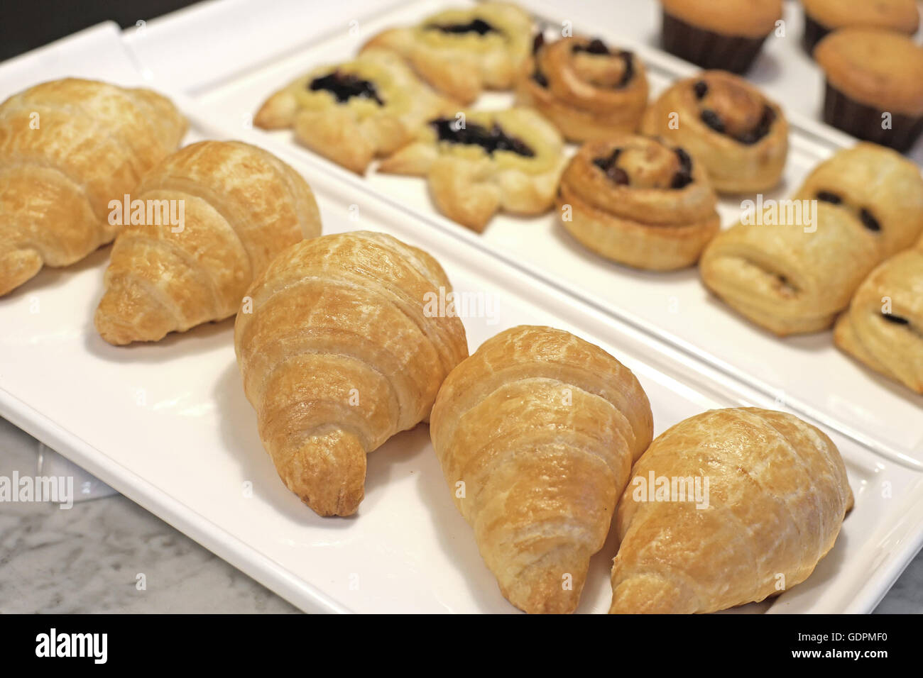 closeup of fresh baked croissants on buffet line Stock Photo - Alamy
