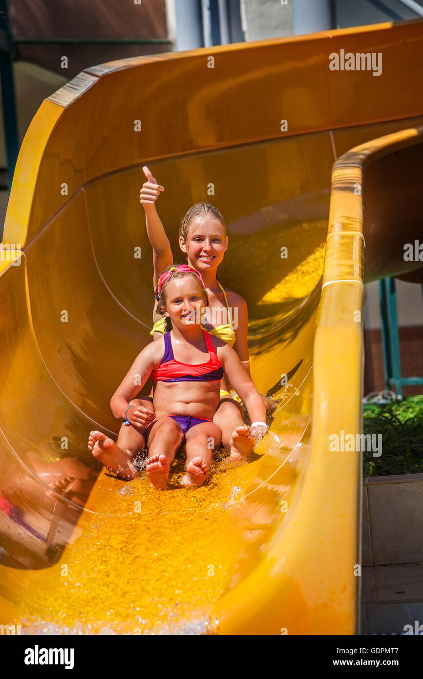Children water park slide down hi-res stock photography and images - Alamy