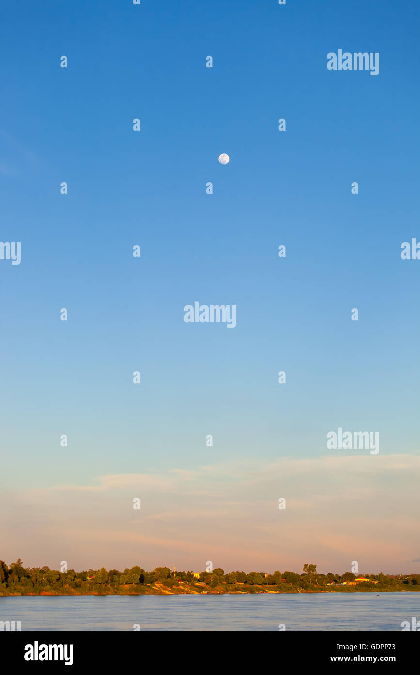 Full moon on sky sunset Stock Photo - Alamy