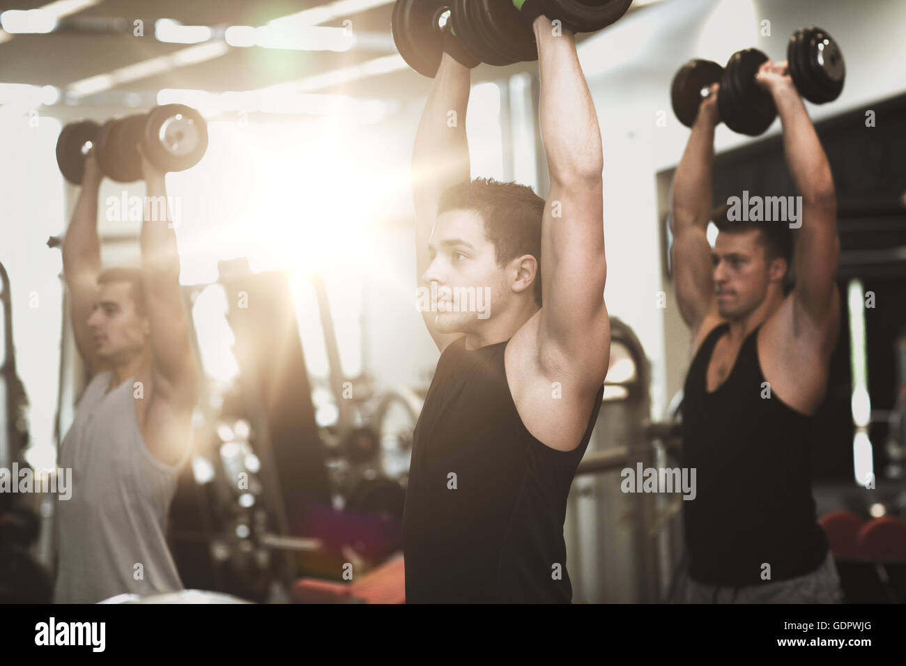 Group men working dumbbells gym hi-res stock photography and images - Alamy