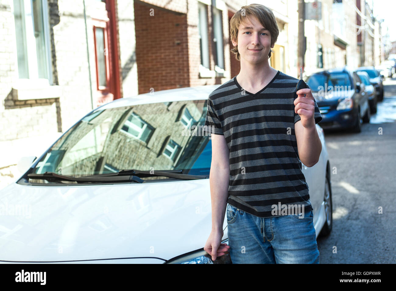 Teenage boy and new driver Stock Photo - Alamy