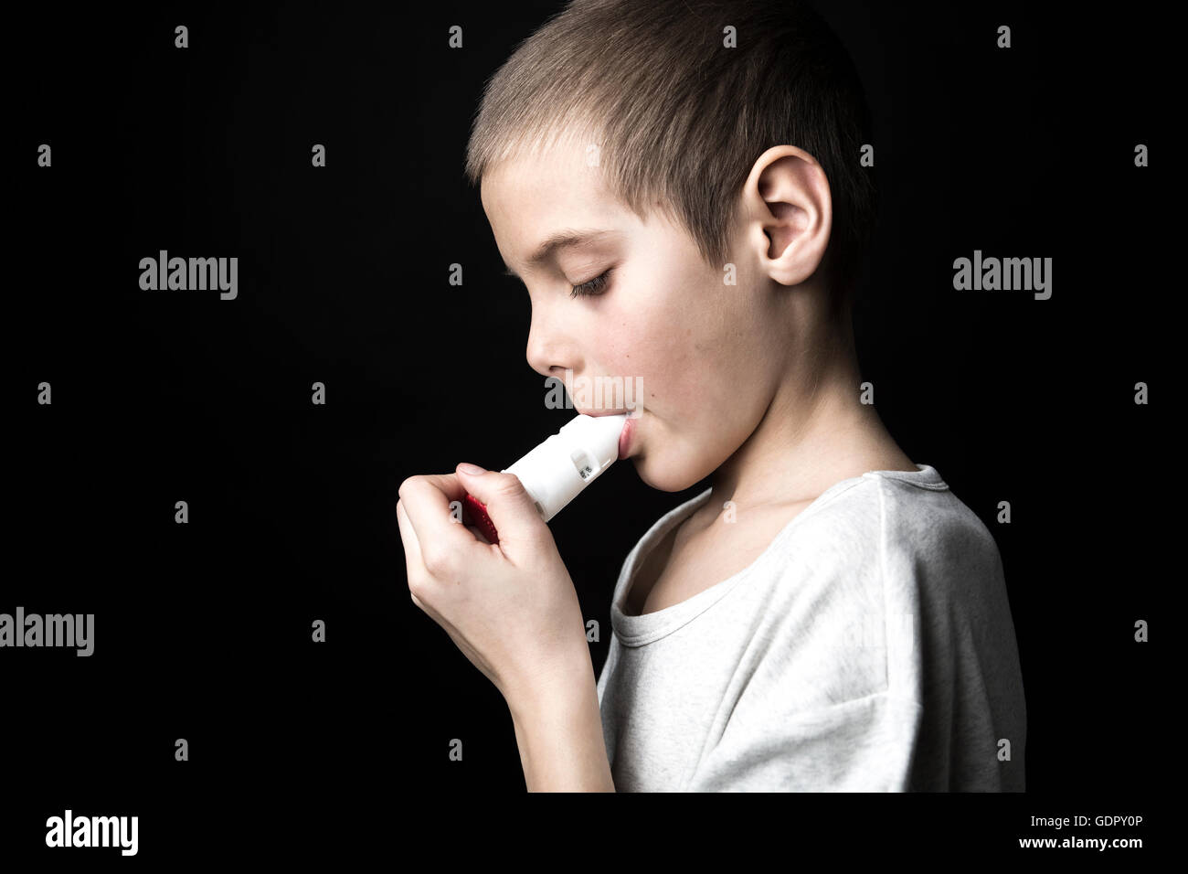 Close up image of a cute little boy using inhaler for asthma Stock ...