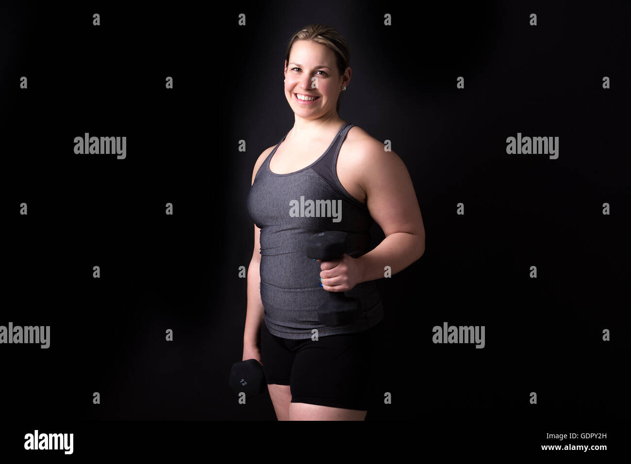 Beautiful woman exercising Stock Photo - Alamy