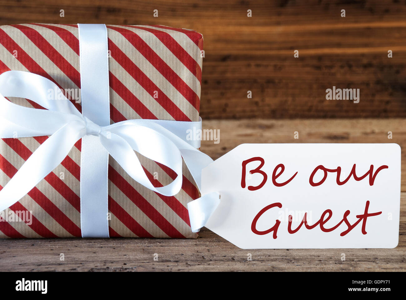 Present With Label, Text Be Our Guest Stock Photo - Alamy