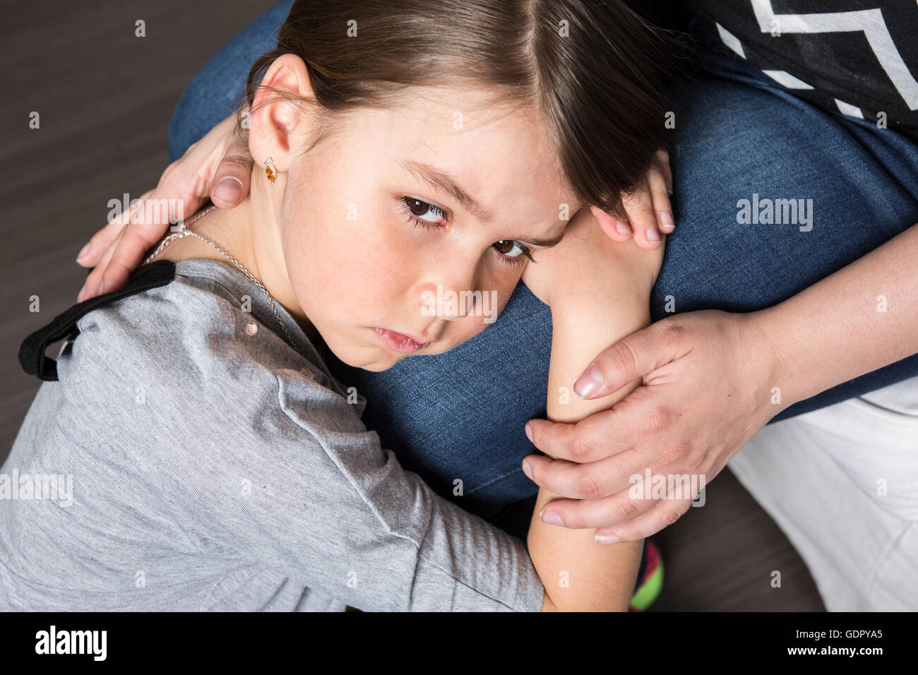 Hugging sad child hi-res stock photography and images - Alamy