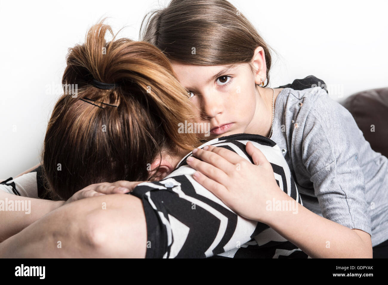 sad mother consoling by his child Stock Photo - Alamy