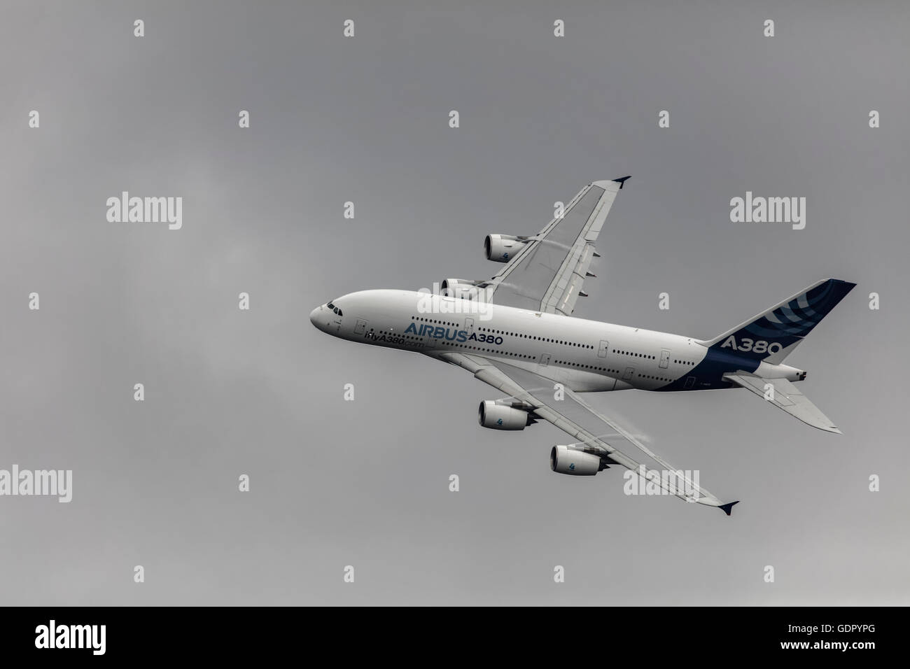 Airbus A380 airplane in flight in grey cloudy skies Stock Photo - Alamy
