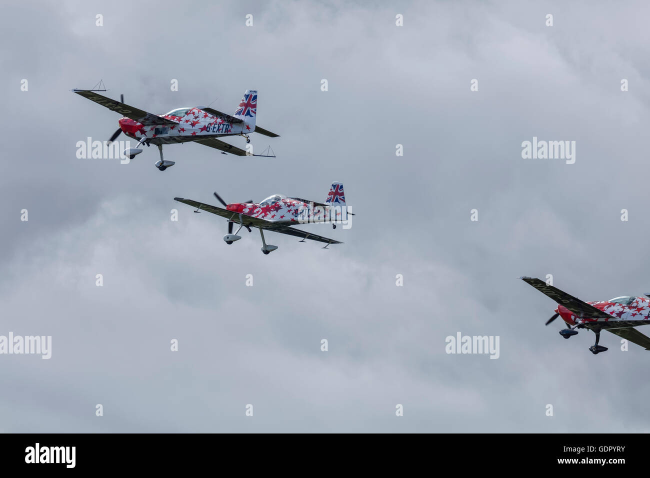Extra EA-300 light airplanes in the skies performing aerobatics ...
