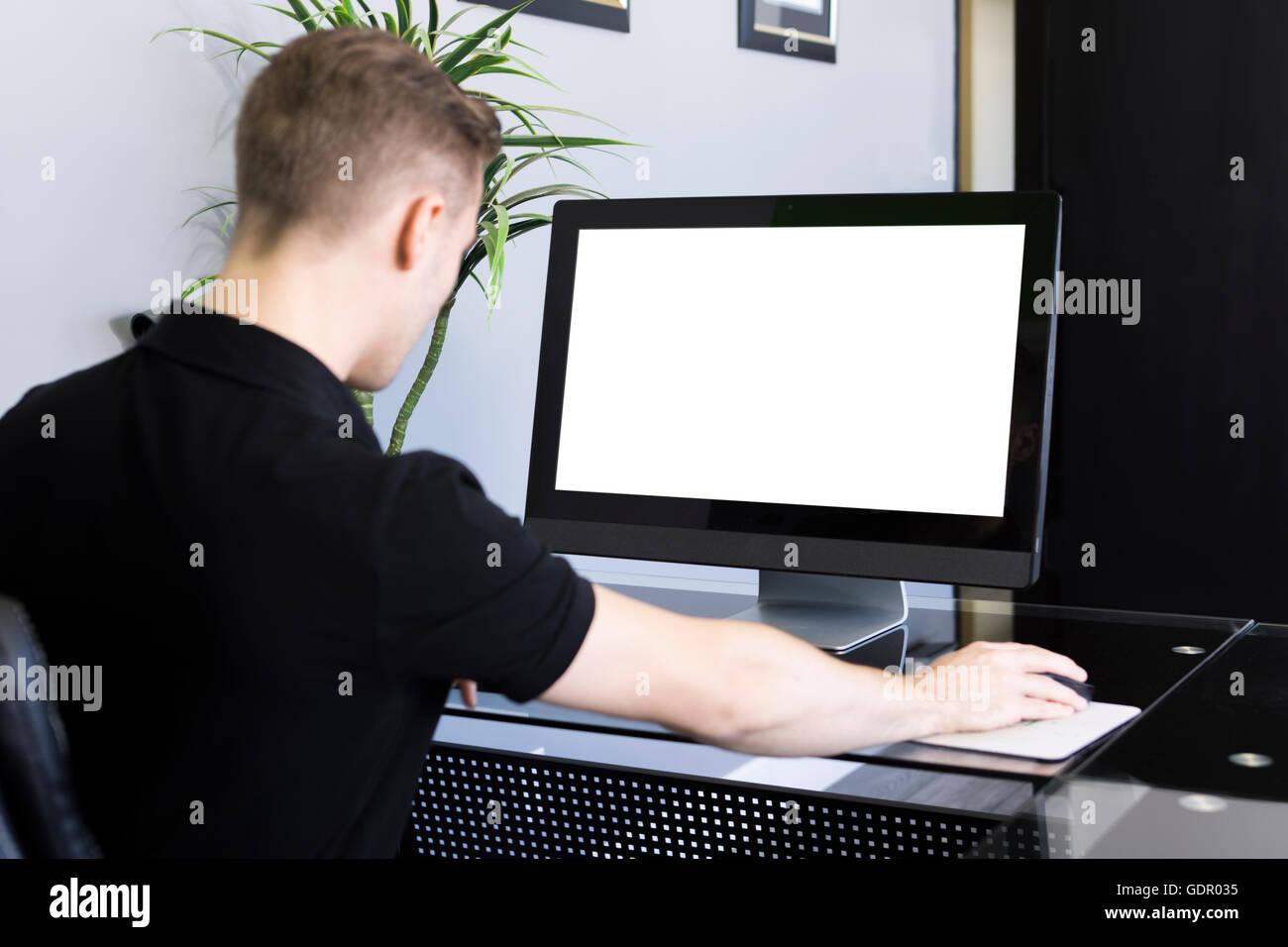 Pretty business men at office desk Stock Photo - Alamy