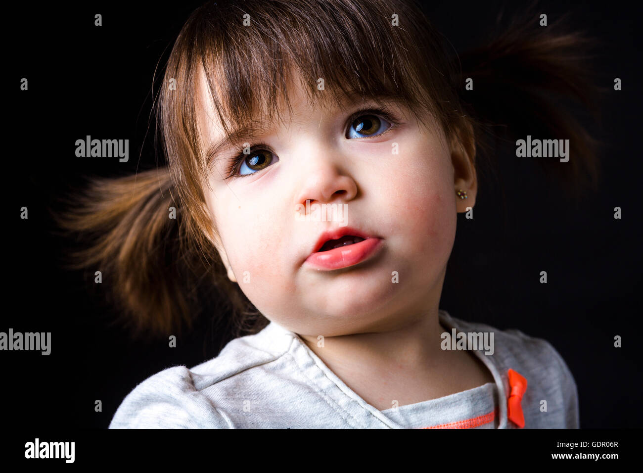 Portrait of a 2 year old girl isolated on white background Stock Photo ...
