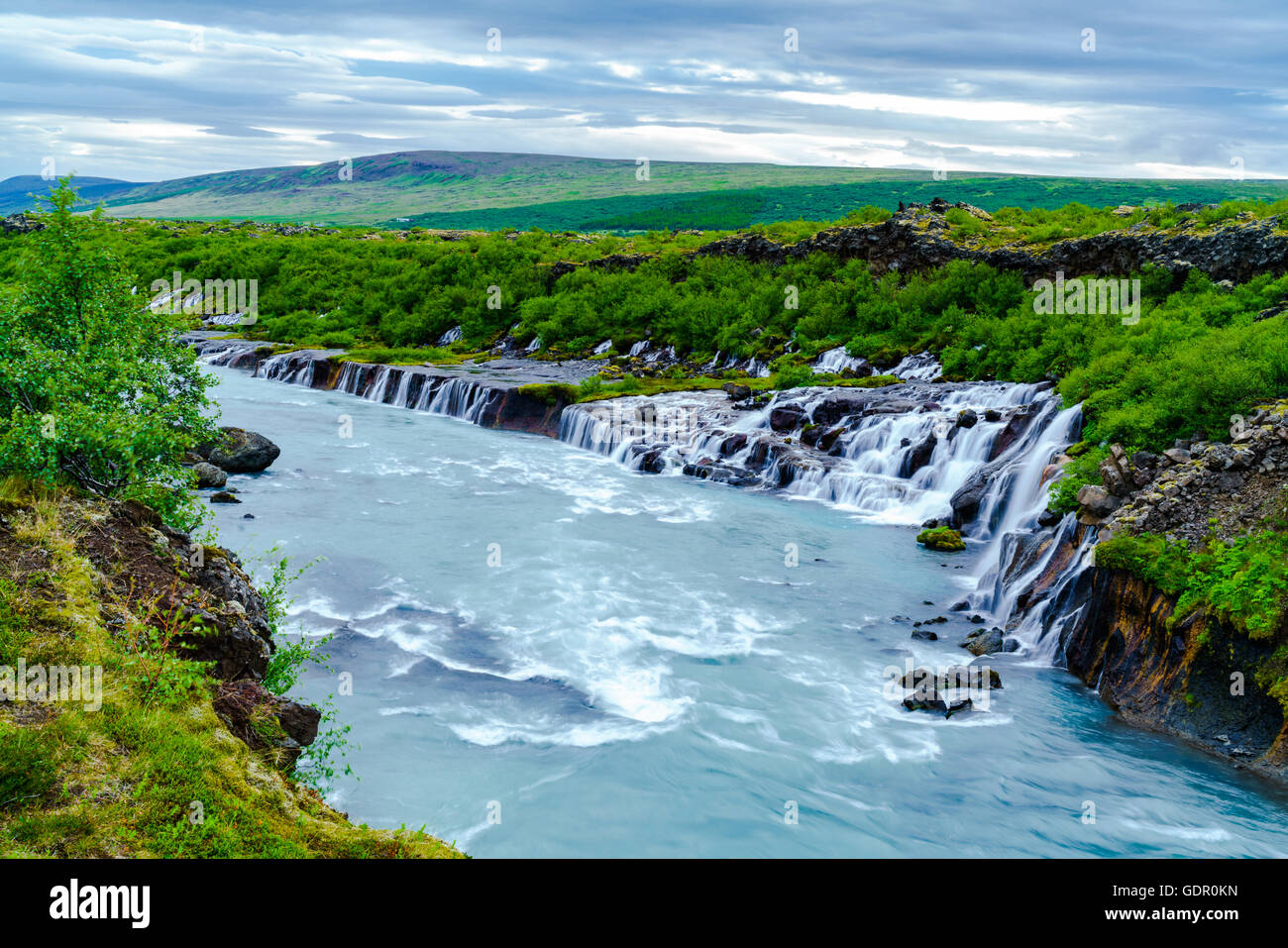 Hraunfossar or Lava Falls is a beautiful waterfalls in the West Iceland ...