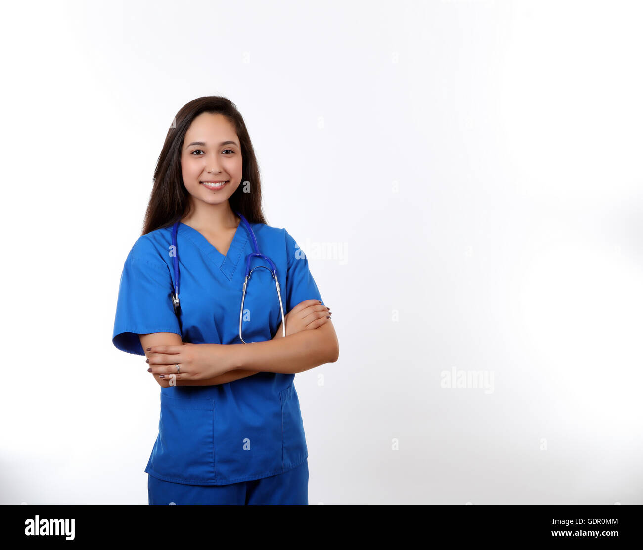 A young friendly nurse smiles at the camera Stock Photo - Alamy