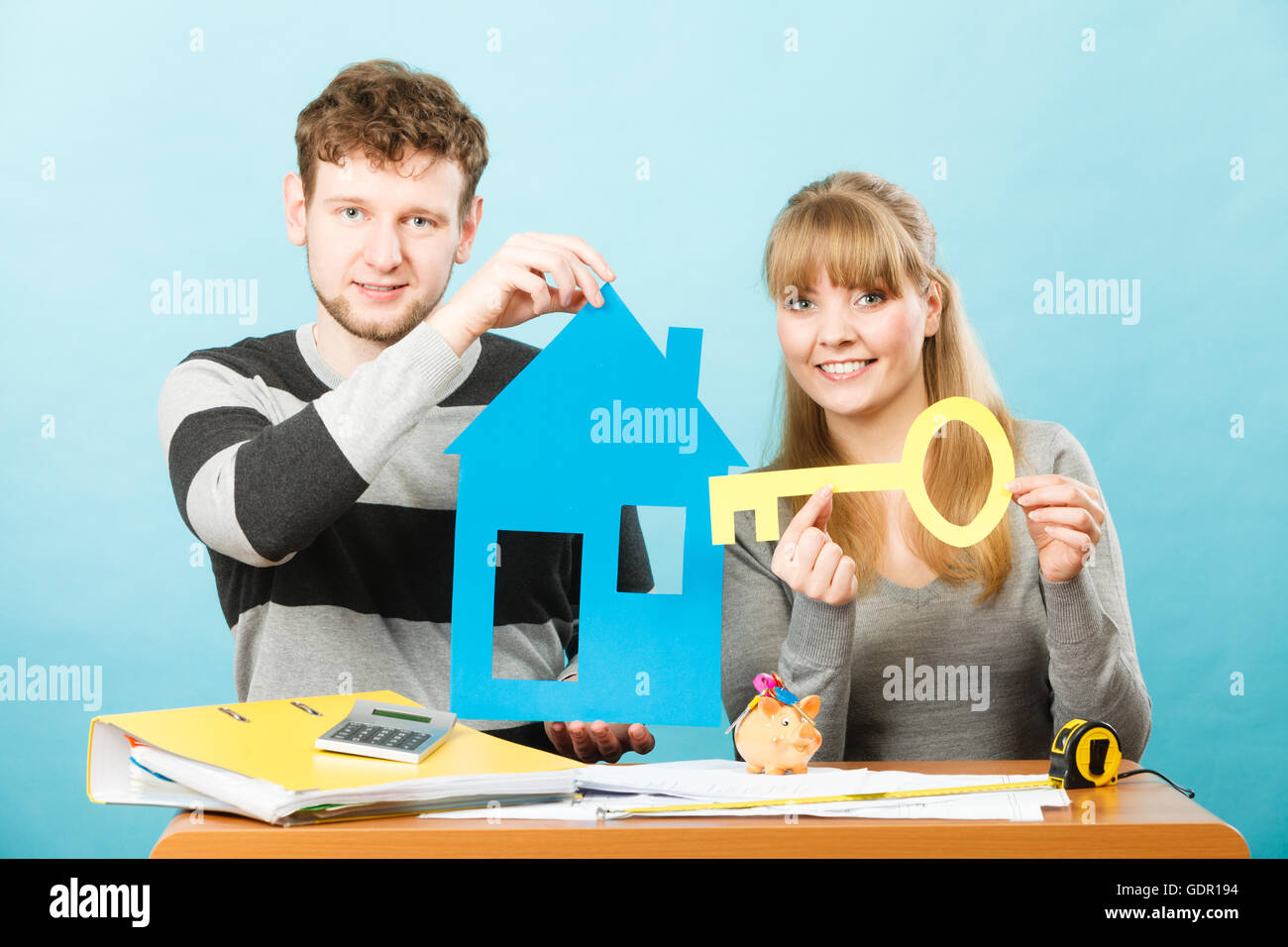 Project and design concept. Couple young marriage with model of their ...