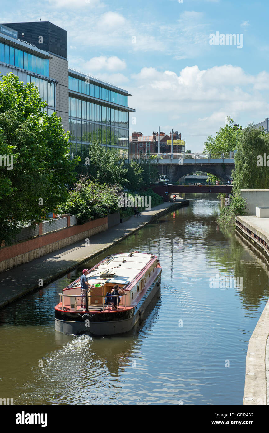 A Barge sailing past Nottingham one apartments on the Nottingham canal ...