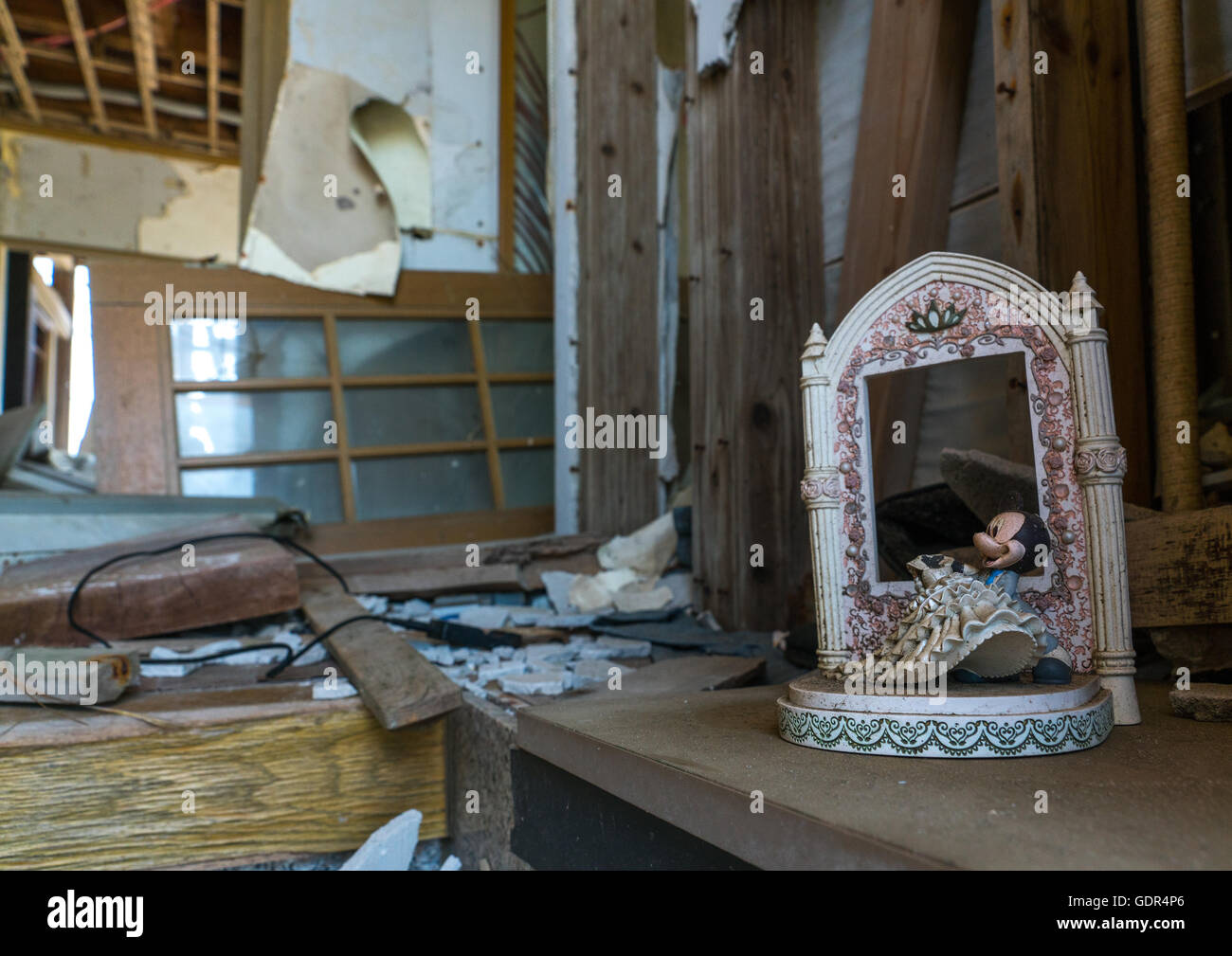 Mickey mouse toy inside a house destroyed by the 2011 earthquake and ...