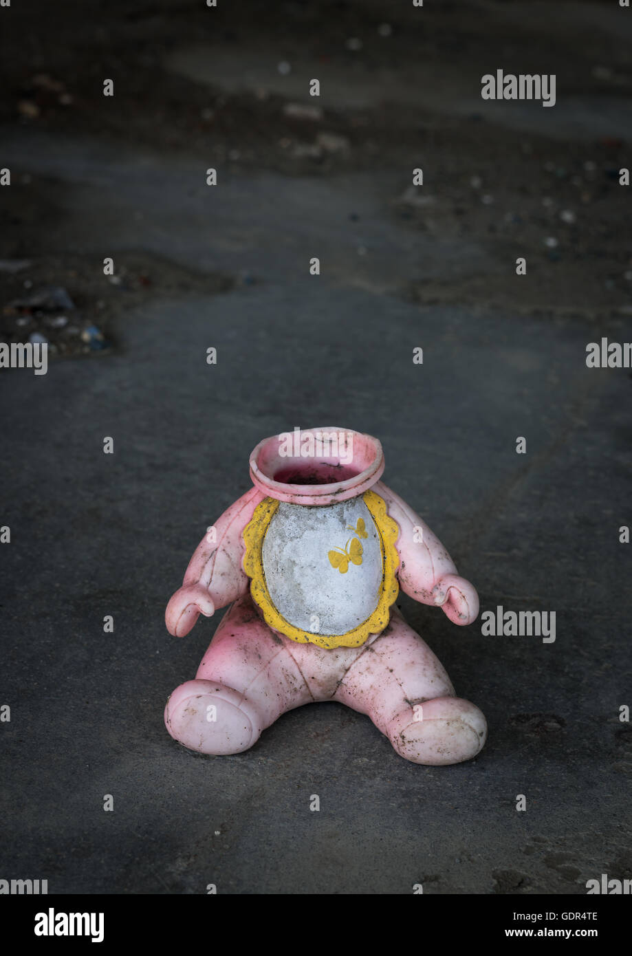A doll without head inside a house destroyed by the 2011 earthquake and ...