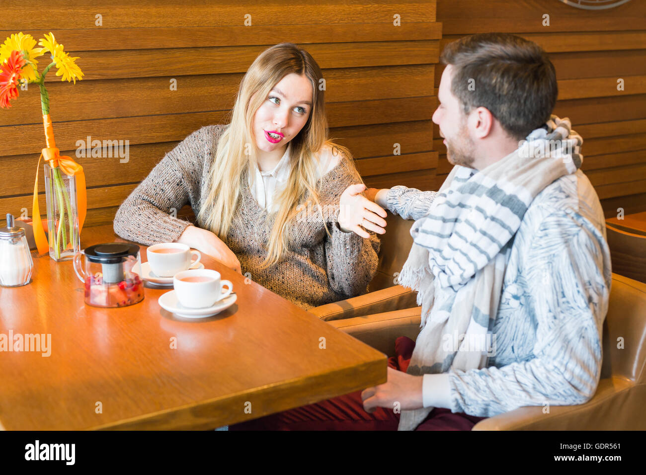 Man and woman arguing indoors Stock Photo - Alamy