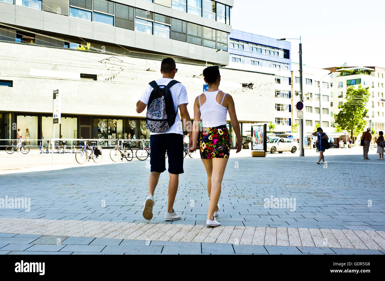 Man woman tourists walking in hi-res stock photography and images - Alamy