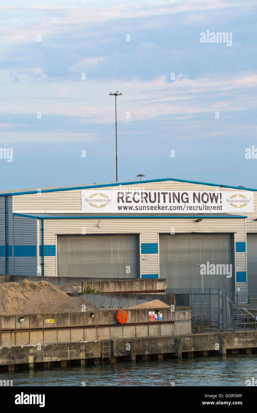Sunseeker recruiting now sign at Sunseeker yard at Poole in July Stock ...