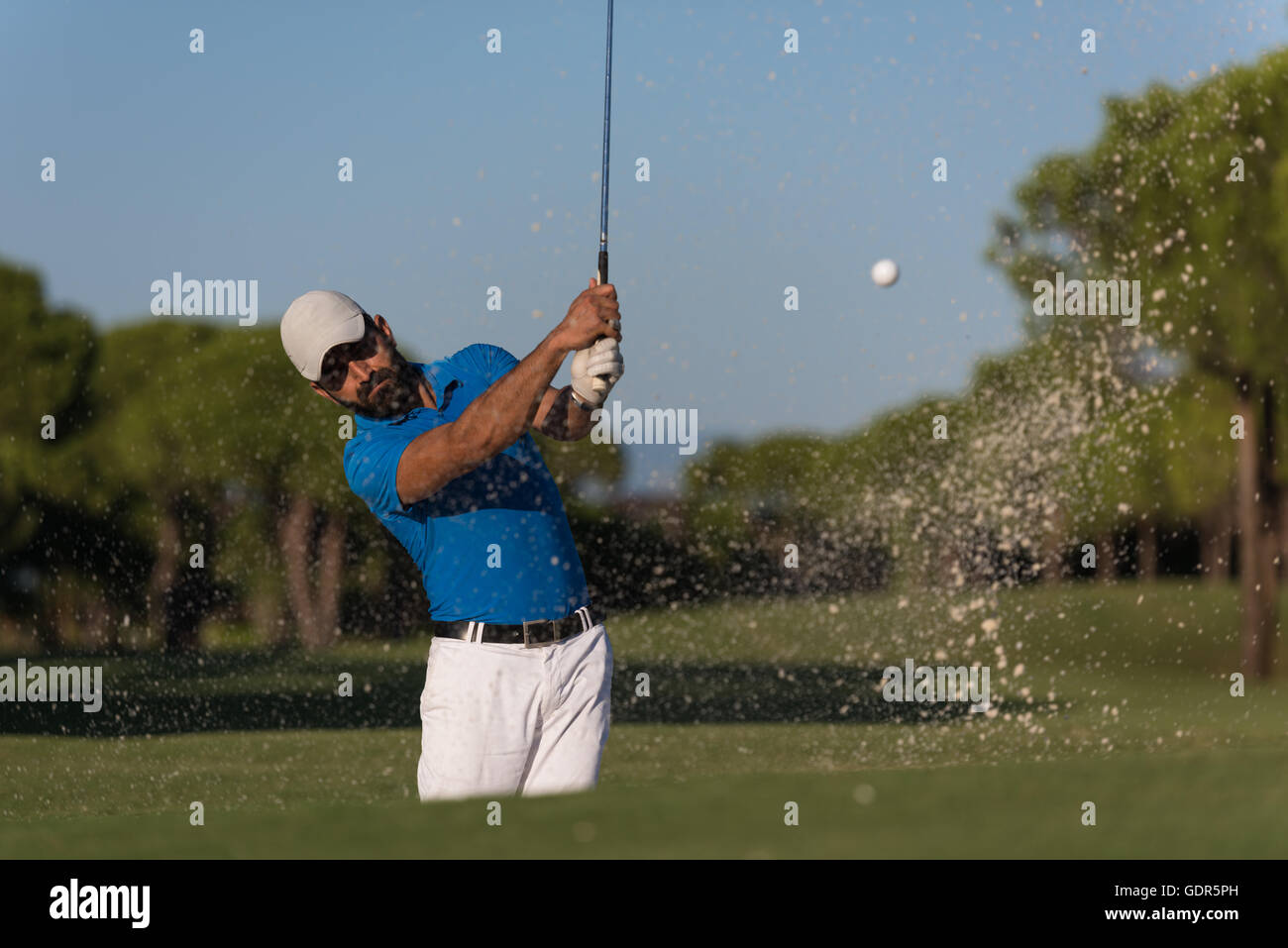 pro golf player shot ball from sand bunker at course Stock Photo - Alamy