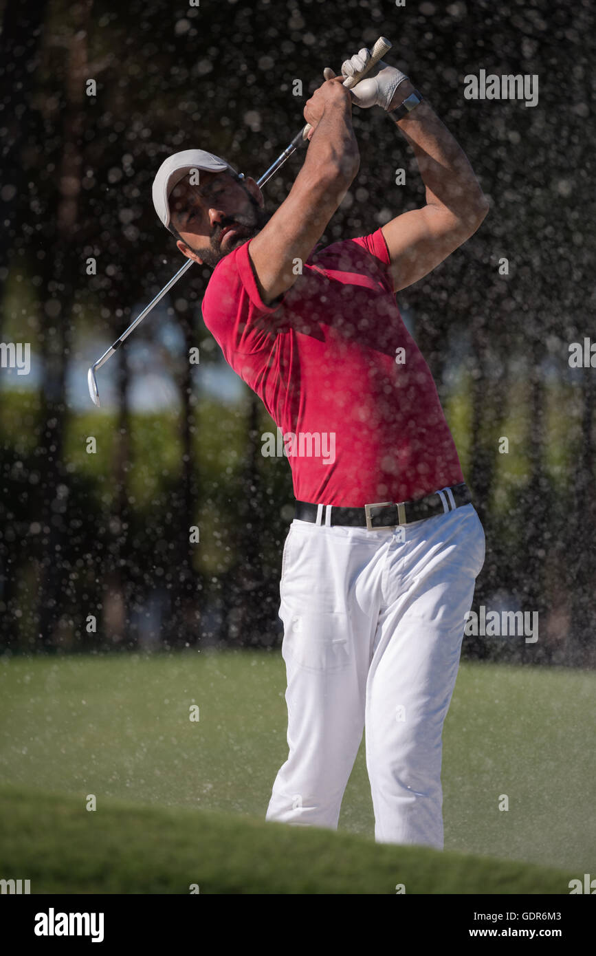 golf player shot ball from sand bunker at course Stock Photo - Alamy