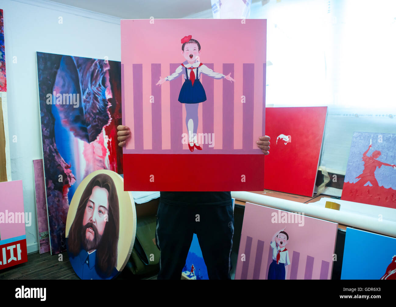 Sun mu artist hiding behind a painting of his happy children serie ...