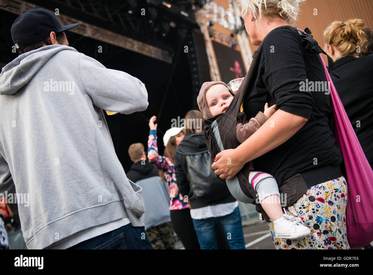 Baby at festival hi-res stock photography and images - Alamy