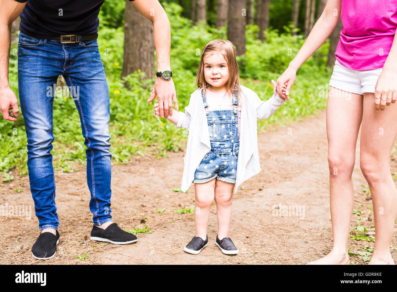 Happy family having fun outdoors and smiling Stock Photo - Alamy