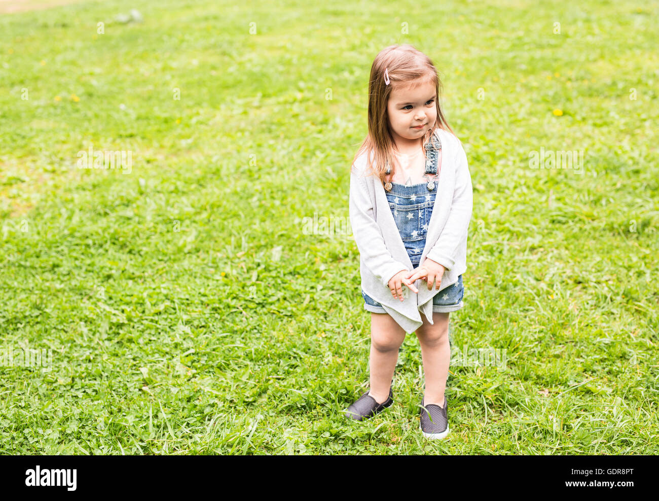 Offended child portrait Stock Photo - Alamy