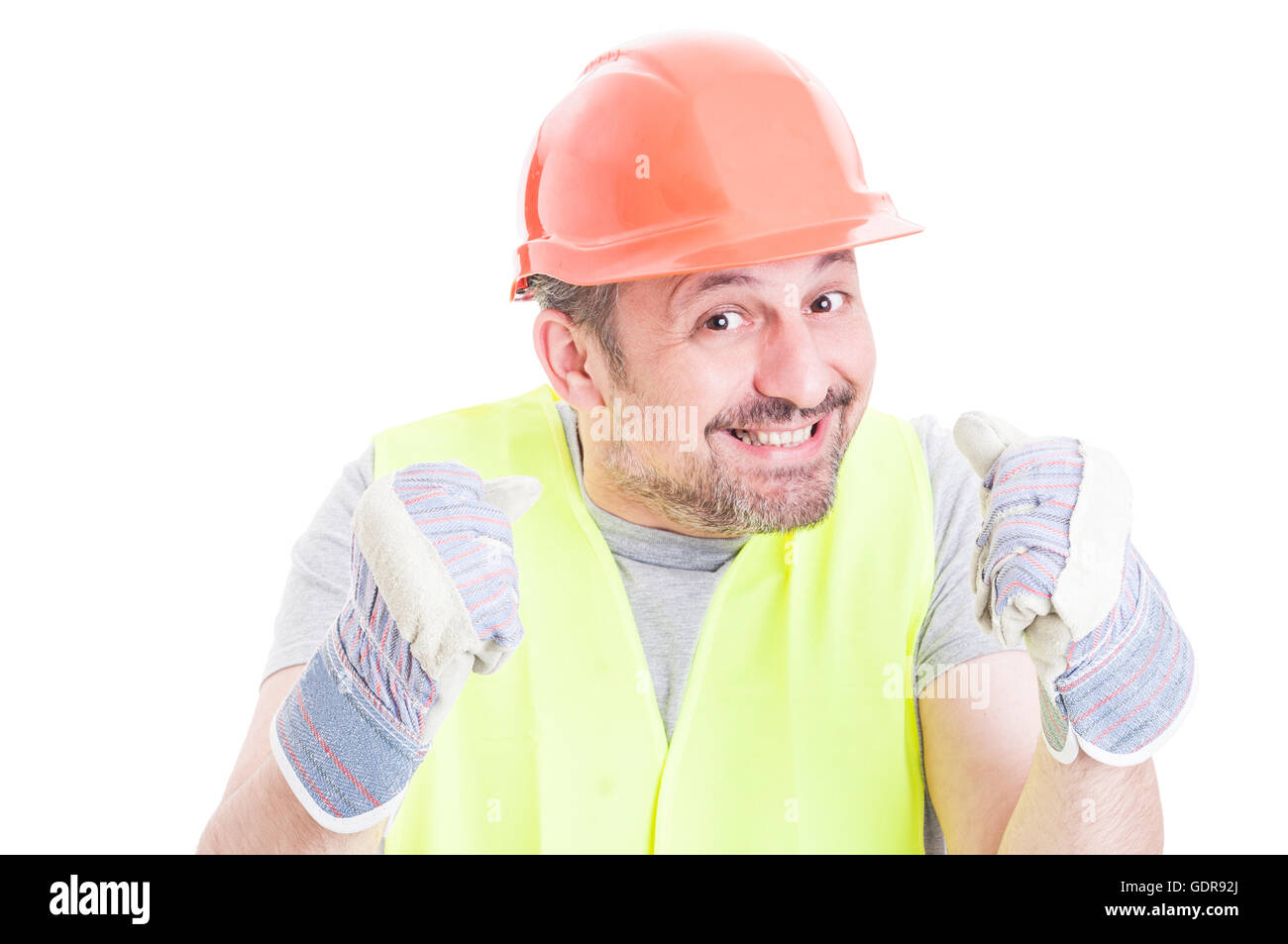 Portrait of handsome smiling builder enjoying success and looking ...