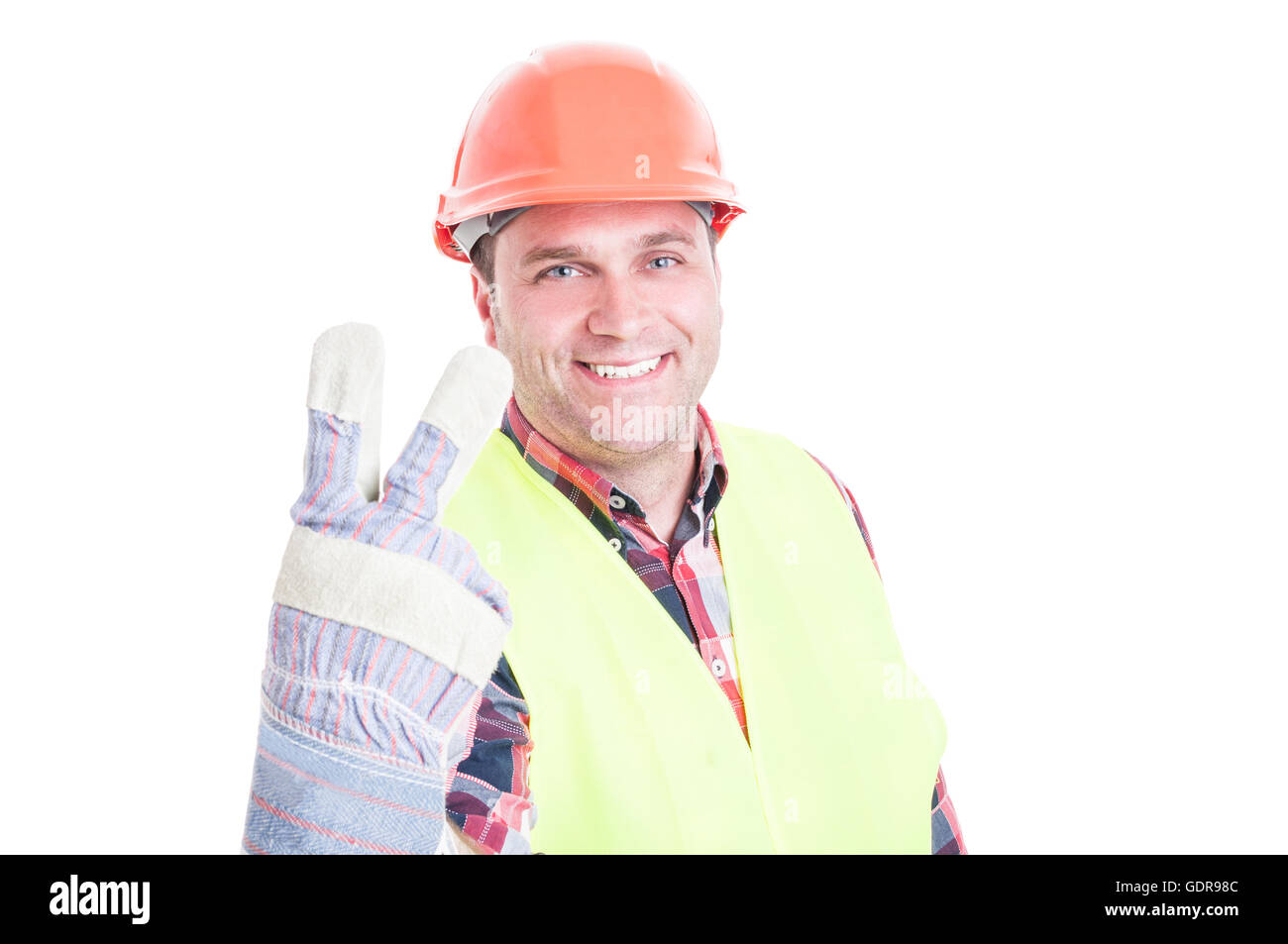 Handsome smiling constructor in protection equipment counting two ...