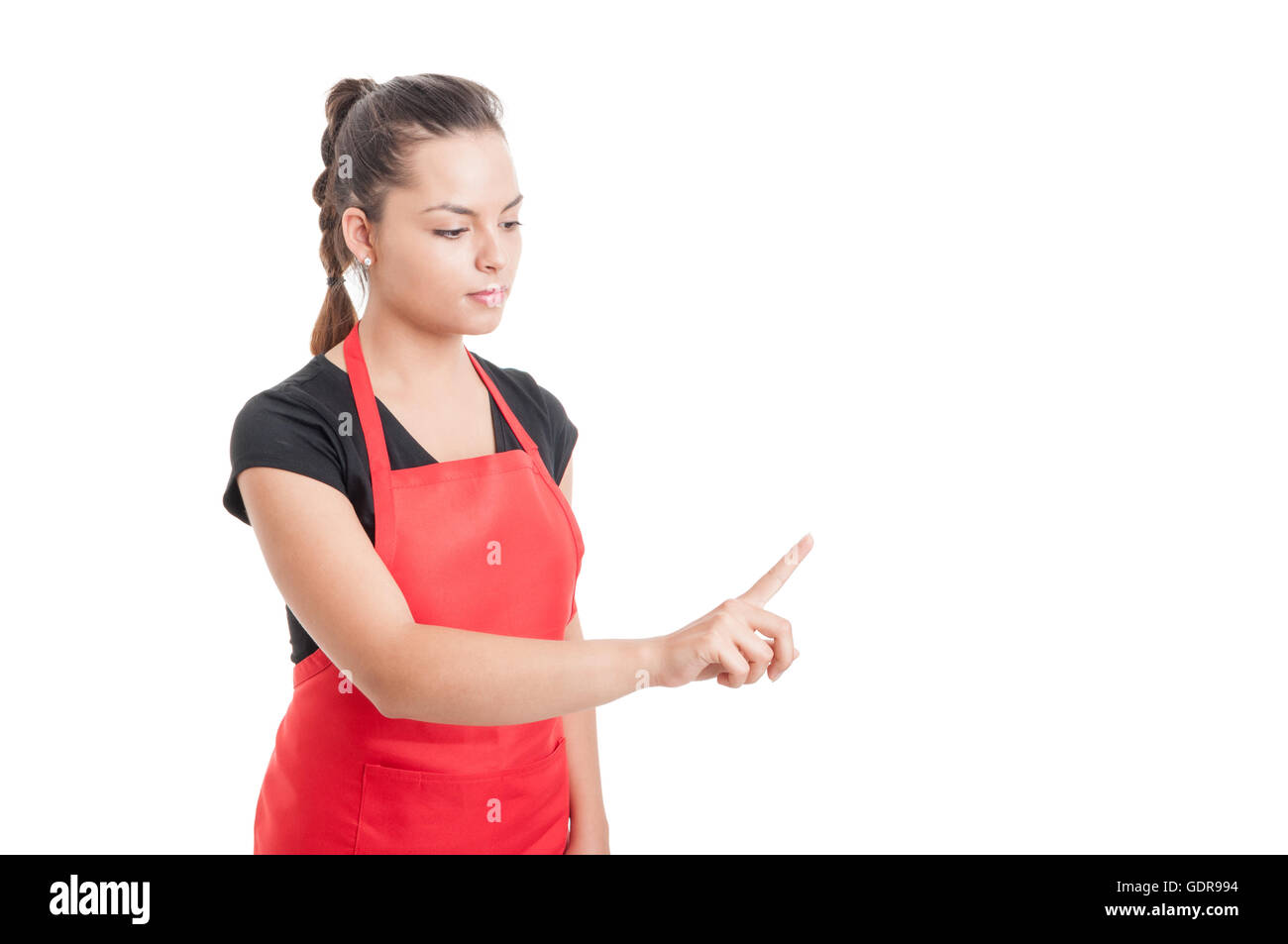 Beautiful supermarket employee pointing finger to something isolated on ...