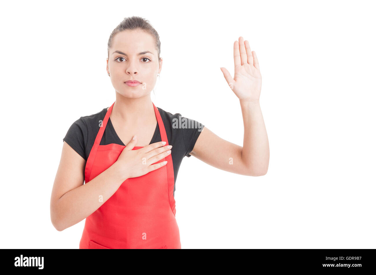 Serious hypermarket employee swearing something as honesty and loyalty ...