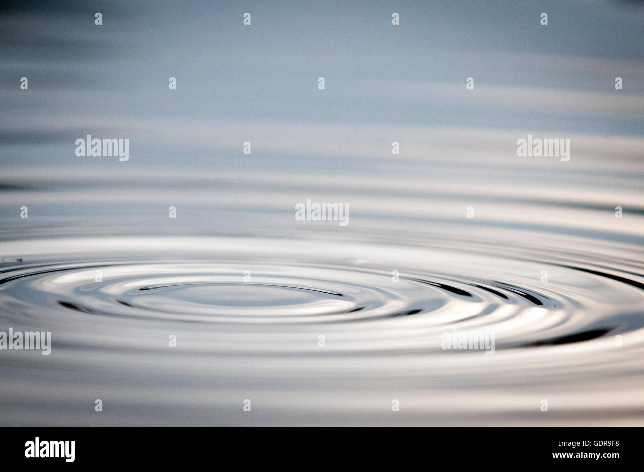 Water Droplets Falling On A Pond Stock Photo - Alamy