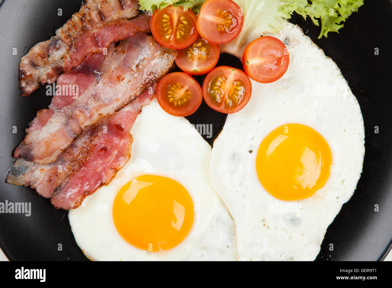 Traditional breakfast on a plate Stock Photo - Alamy