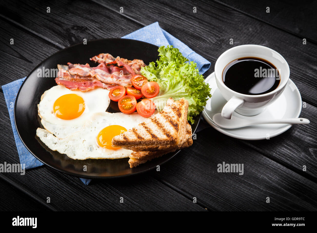 Traditional breakfast on a plate Stock Photo - Alamy