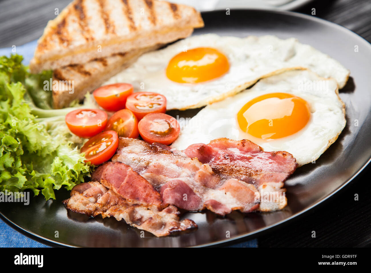Traditional breakfast on a plate Stock Photo - Alamy