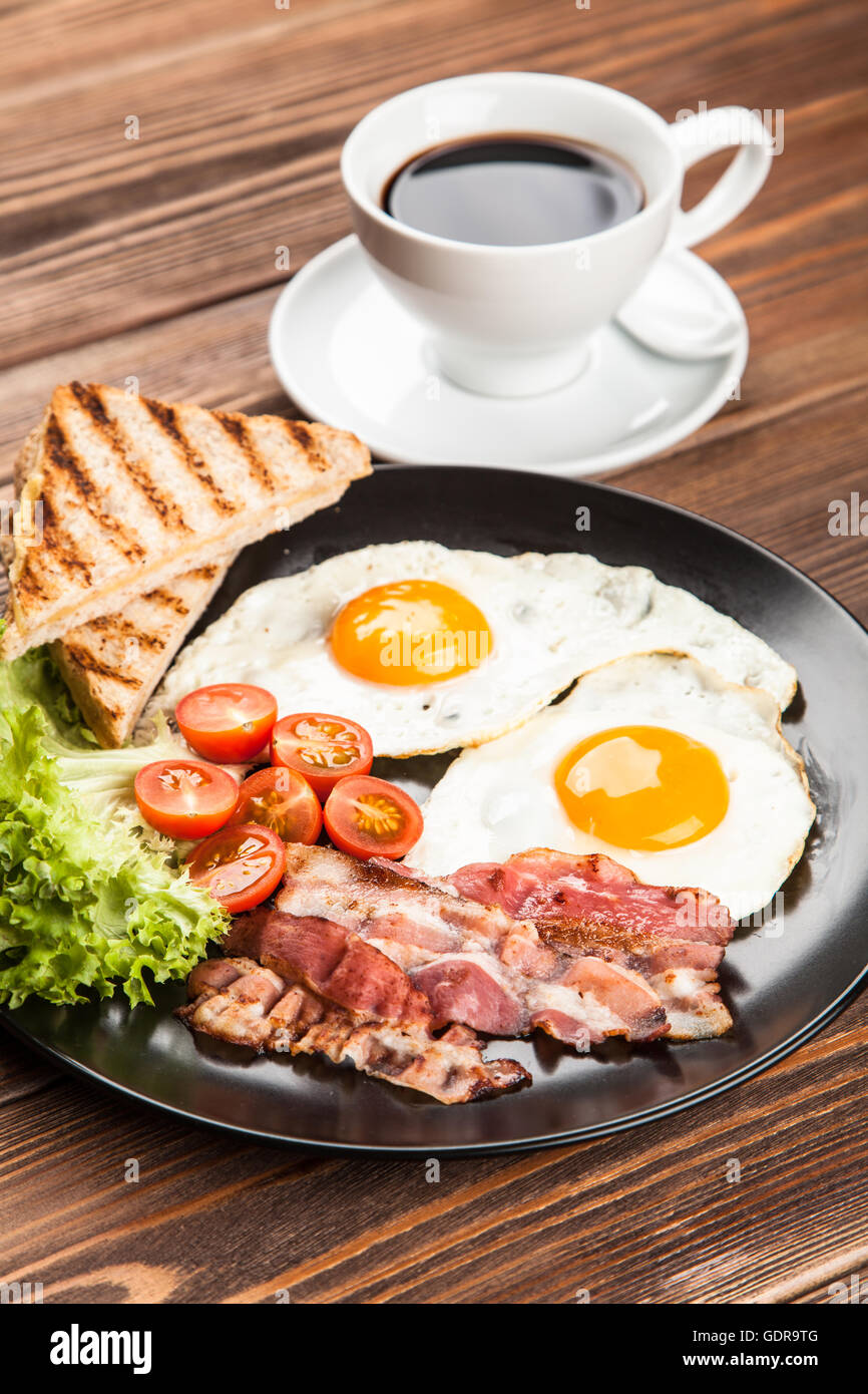 Traditional breakfast on a plate Stock Photo - Alamy